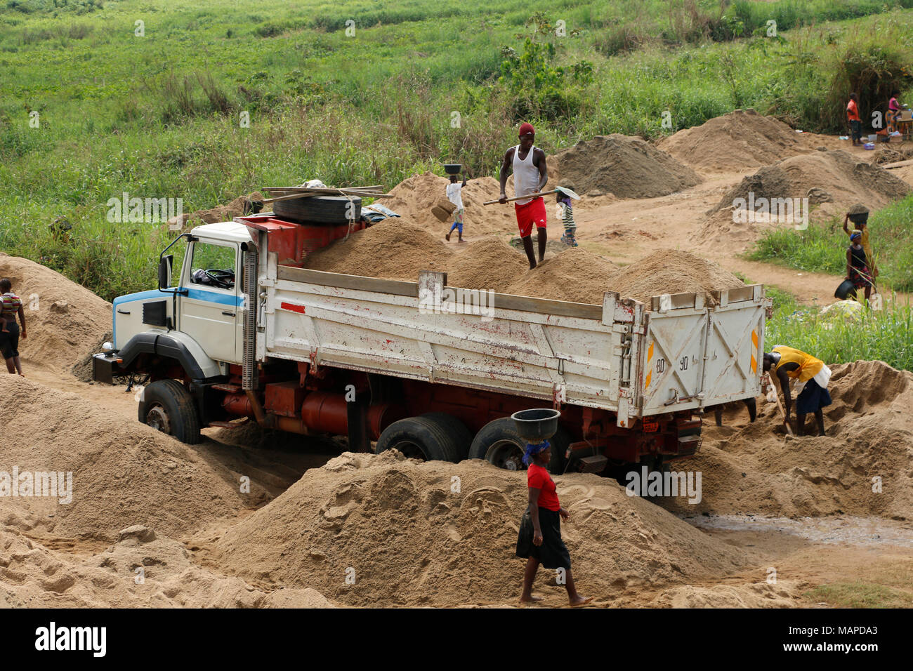 People digging sand in the river for constructions for houses Stock ...