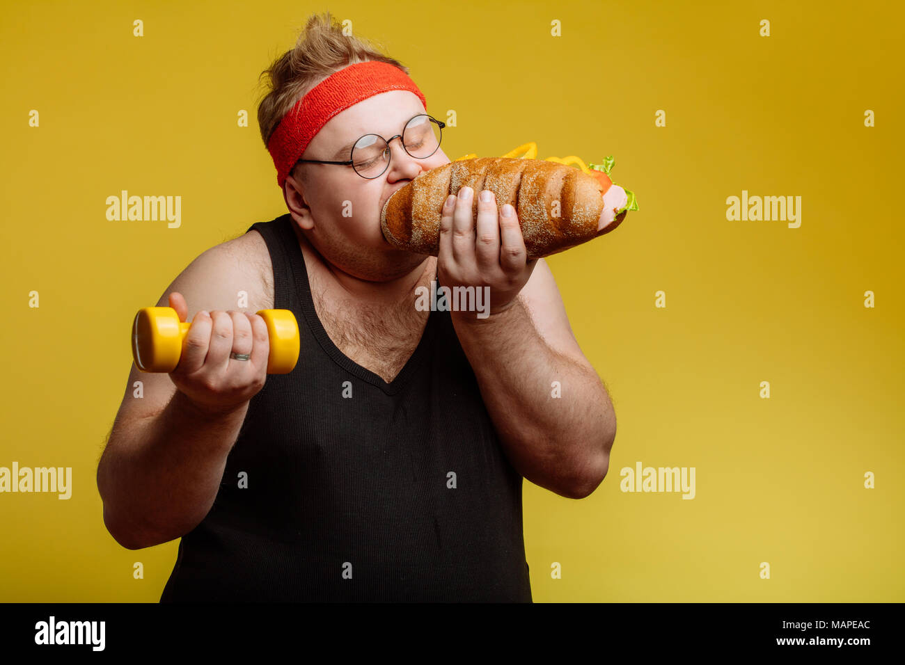 Fat Man Eating Chili Dogs