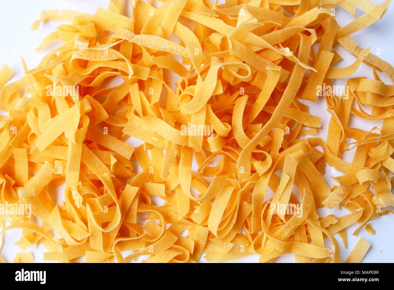 Homemade noodles on white background Stock Photo - Alamy