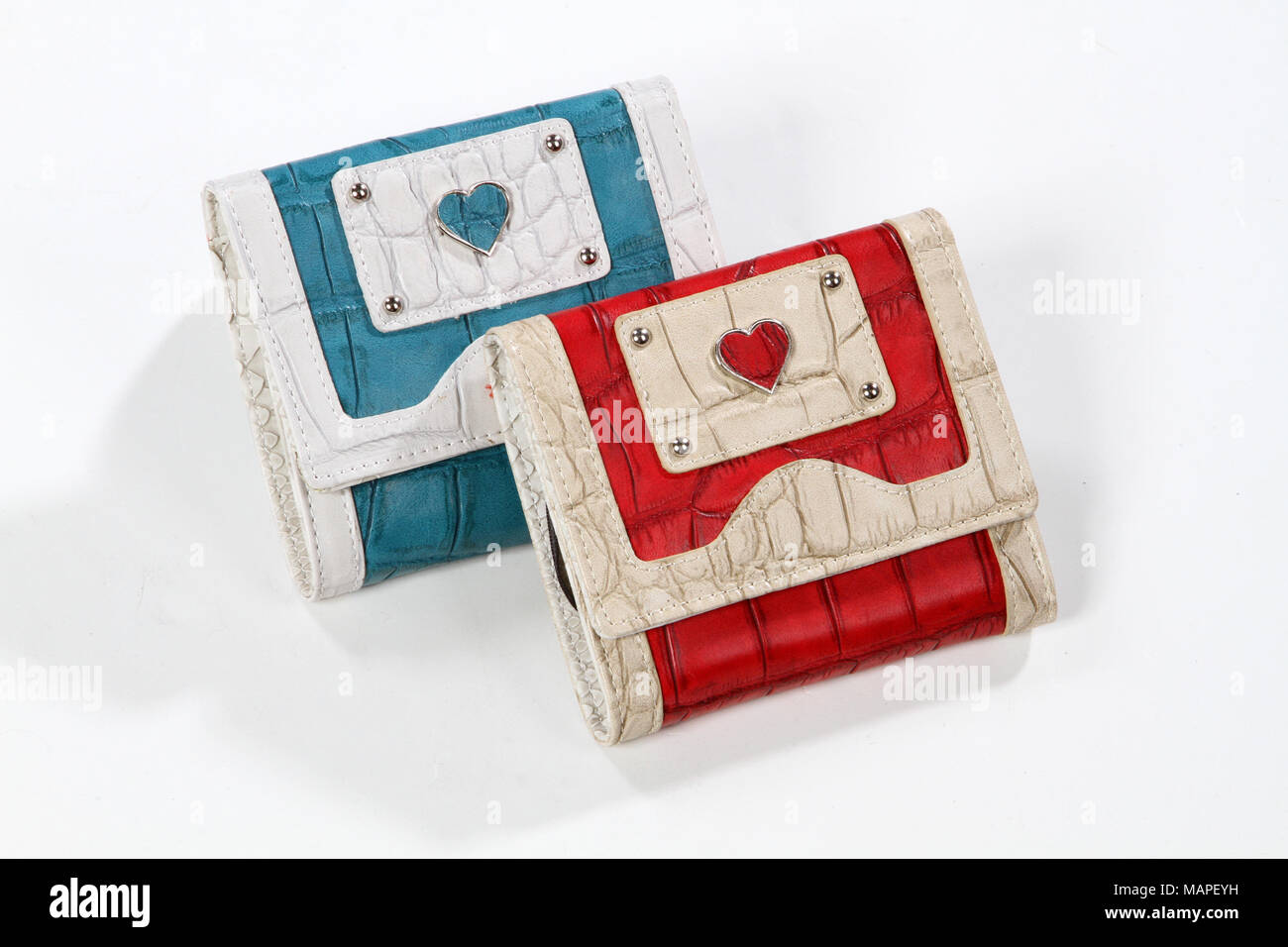 red and blue leather wallets with hearts Stock Photo - Alamy