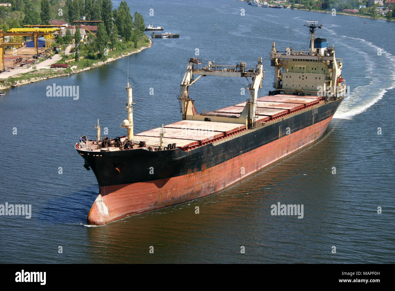 Big cargo ship arriving in port, see, ocean Stock Photo - Alamy