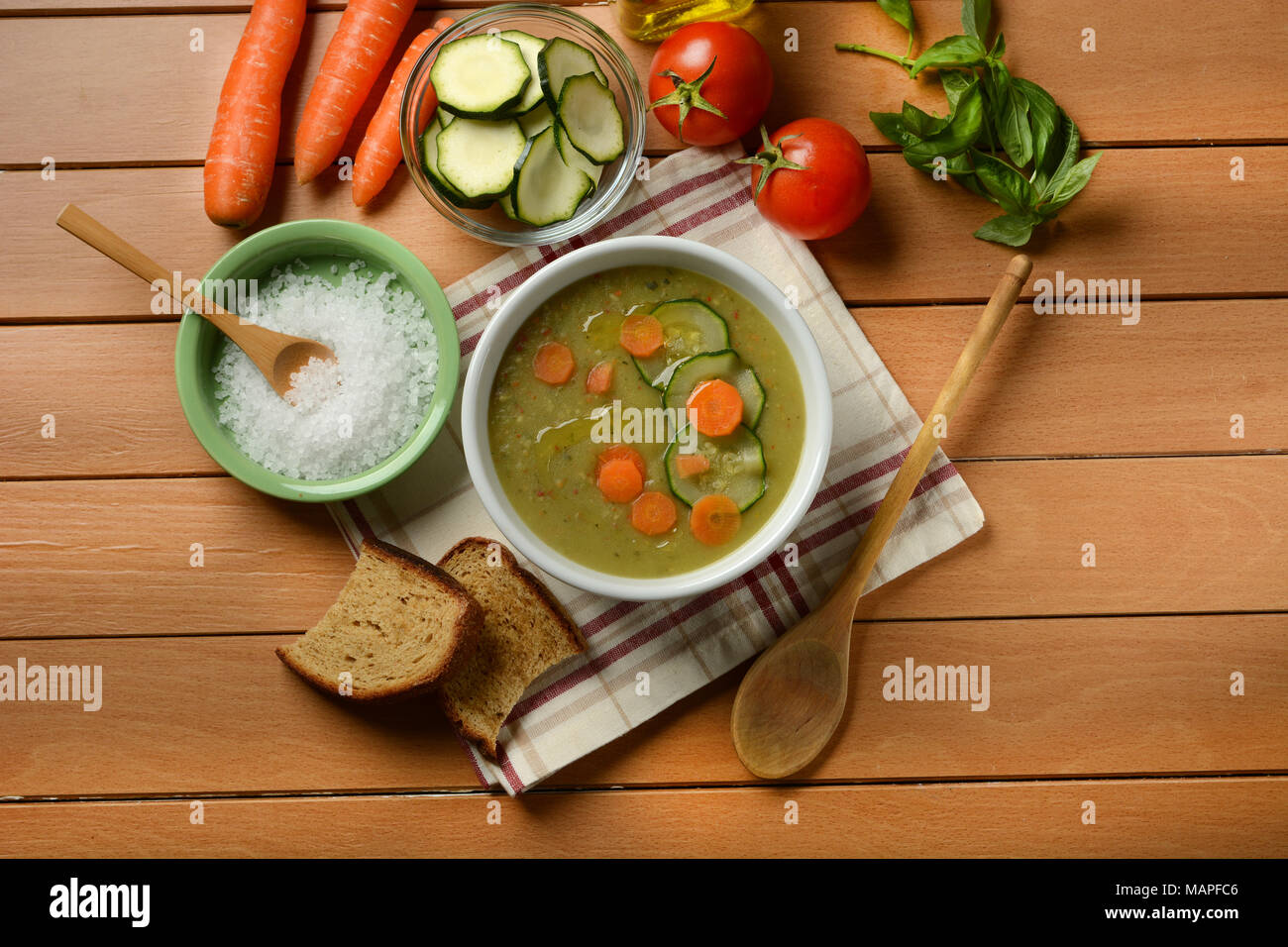 assorted vegetable soup with ingredients around - closeup Stock Photo ...
