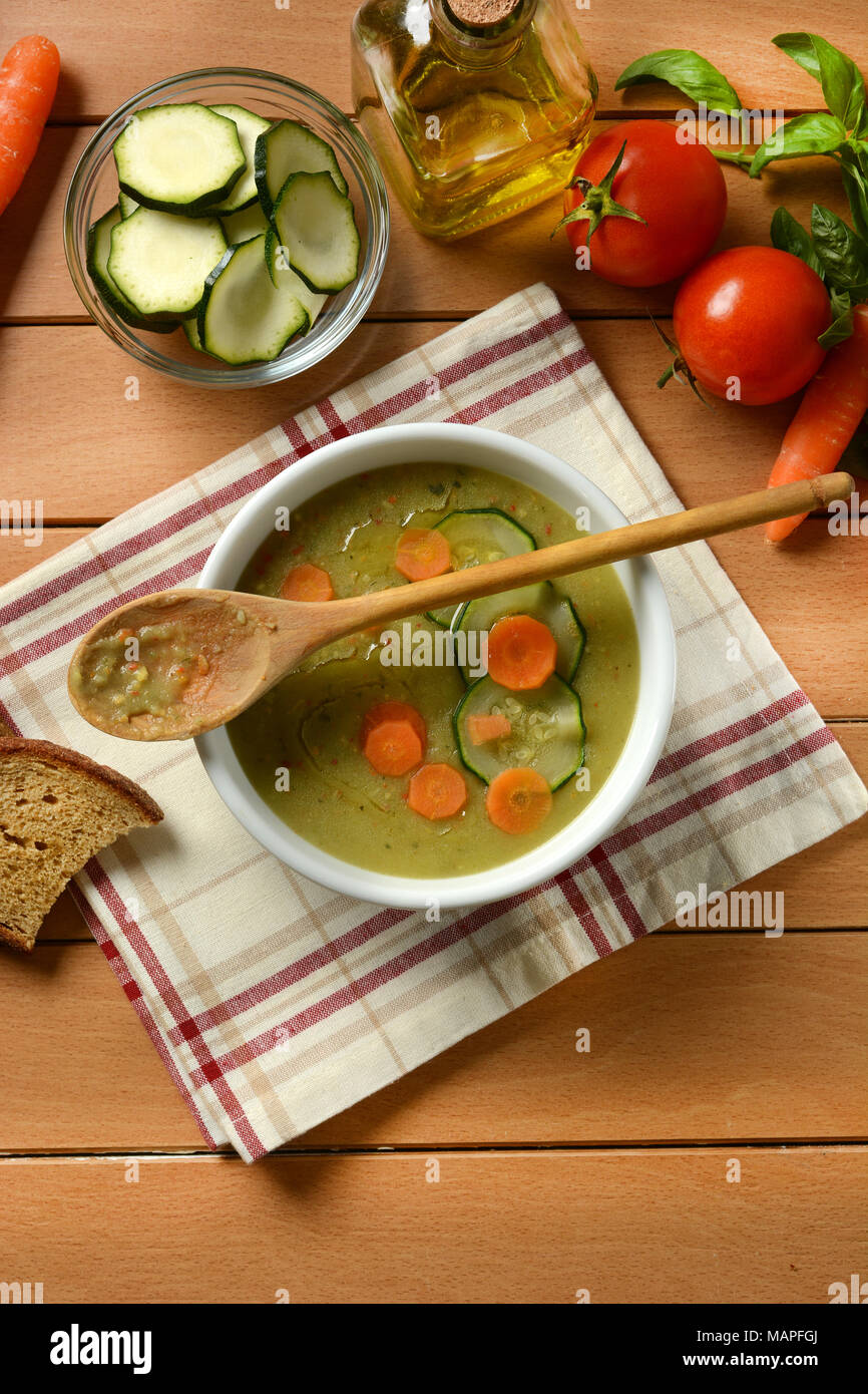 assorted vegetable soup with ingredients around - closeup Stock Photo ...