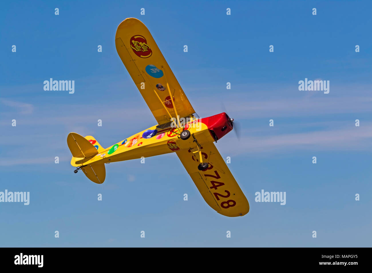 Airplane flying and performing stunts at air show Stock Photo - Alamy