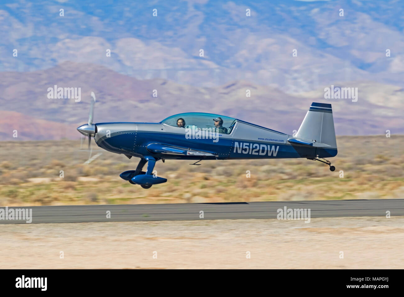 Airplane flying and performing stunts at air show Stock Photo - Alamy