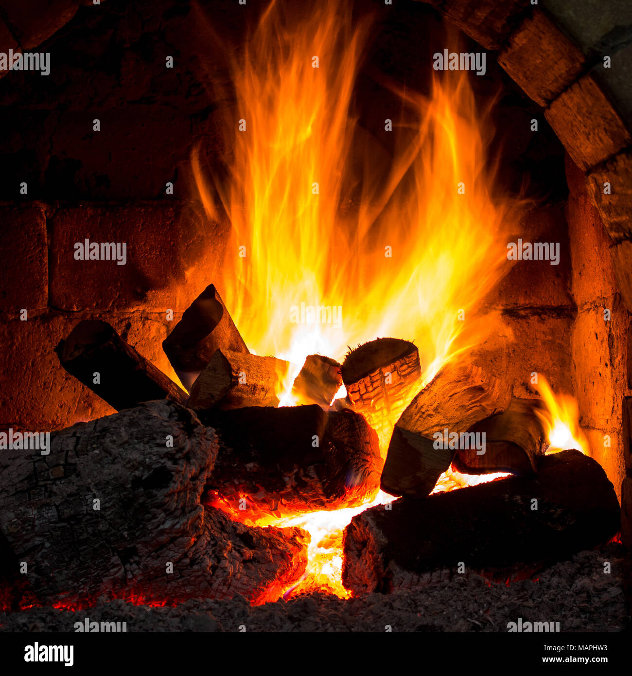 A fire burns in a fireplace Stock Photo - Alamy