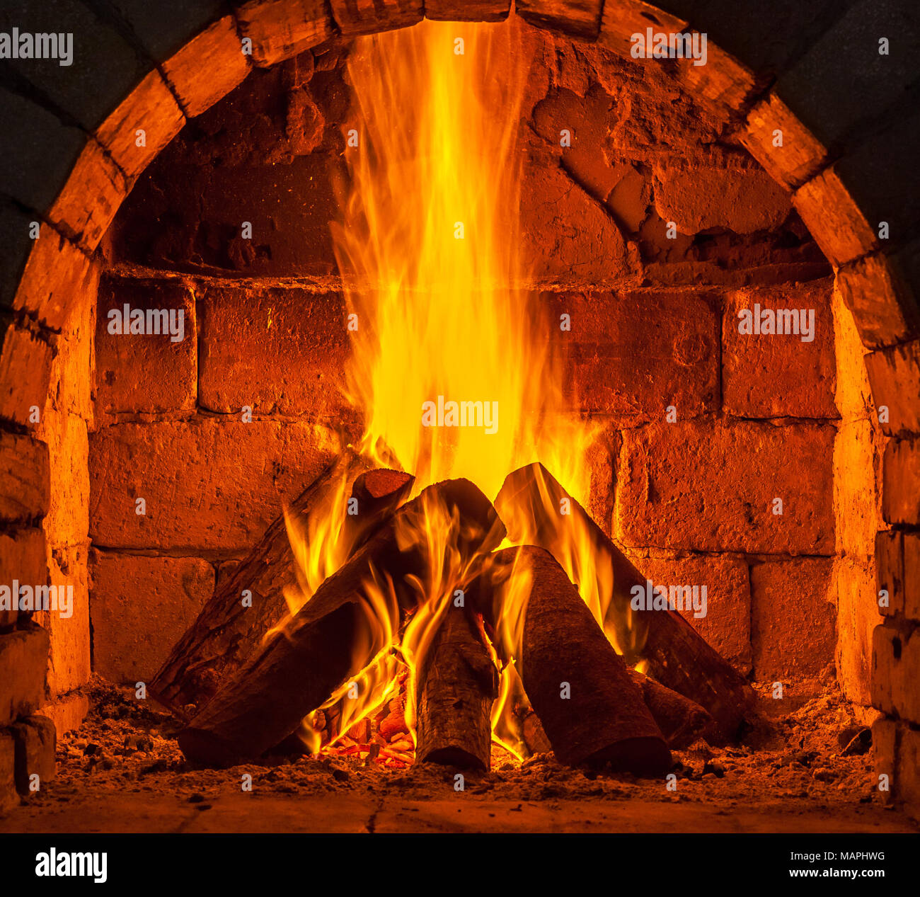 A fire burns in a fireplace Stock Photo - Alamy