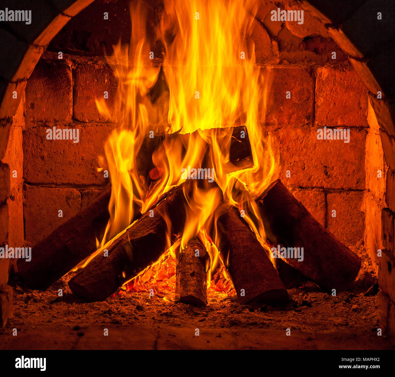 A fire burns in a fireplace Stock Photo - Alamy
