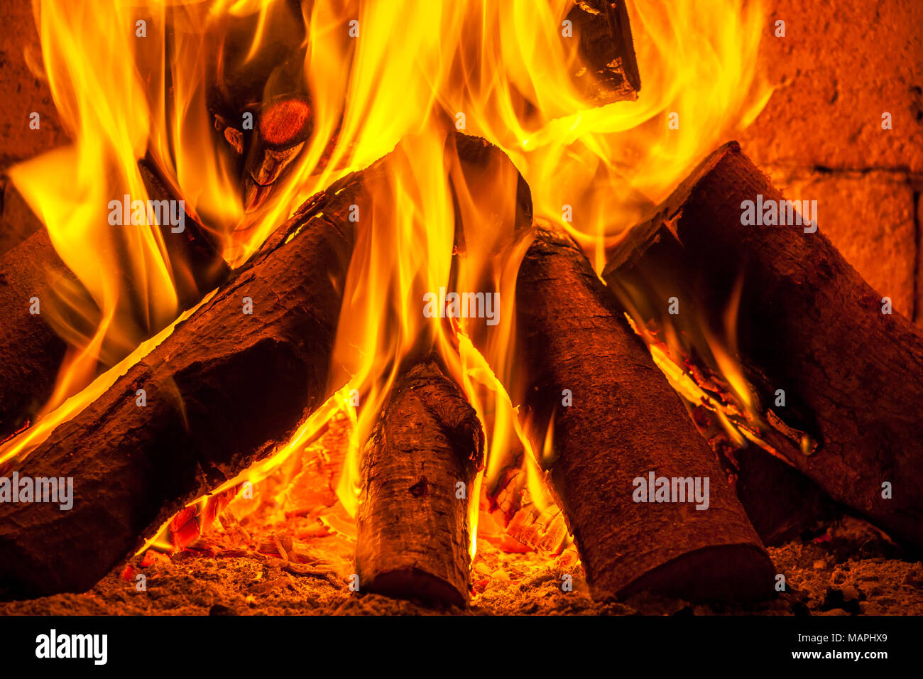 A fire burns in a fireplace Stock Photo - Alamy