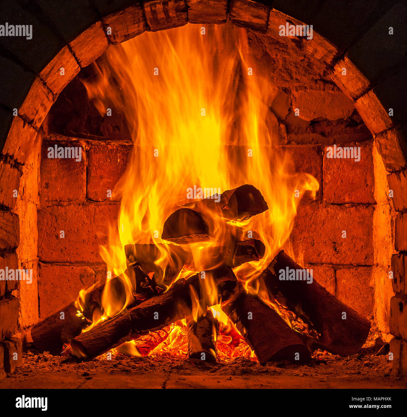 A fire burns in a fireplace Stock Photo - Alamy