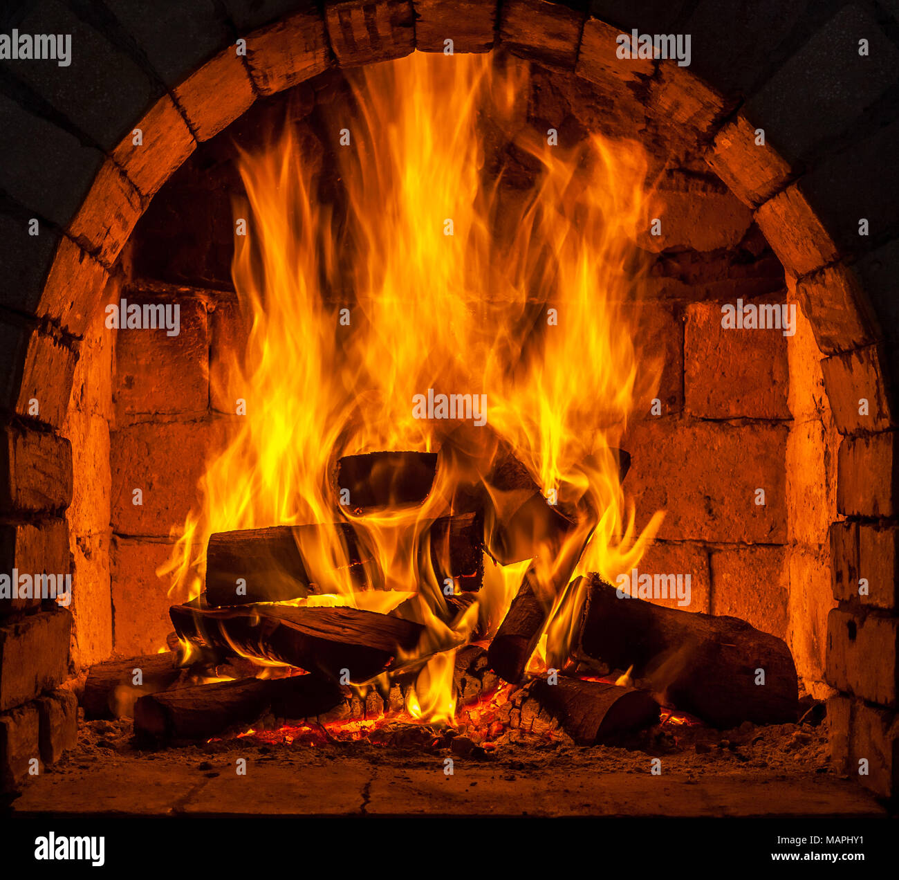 A fire burns in a fireplace Stock Photo - Alamy