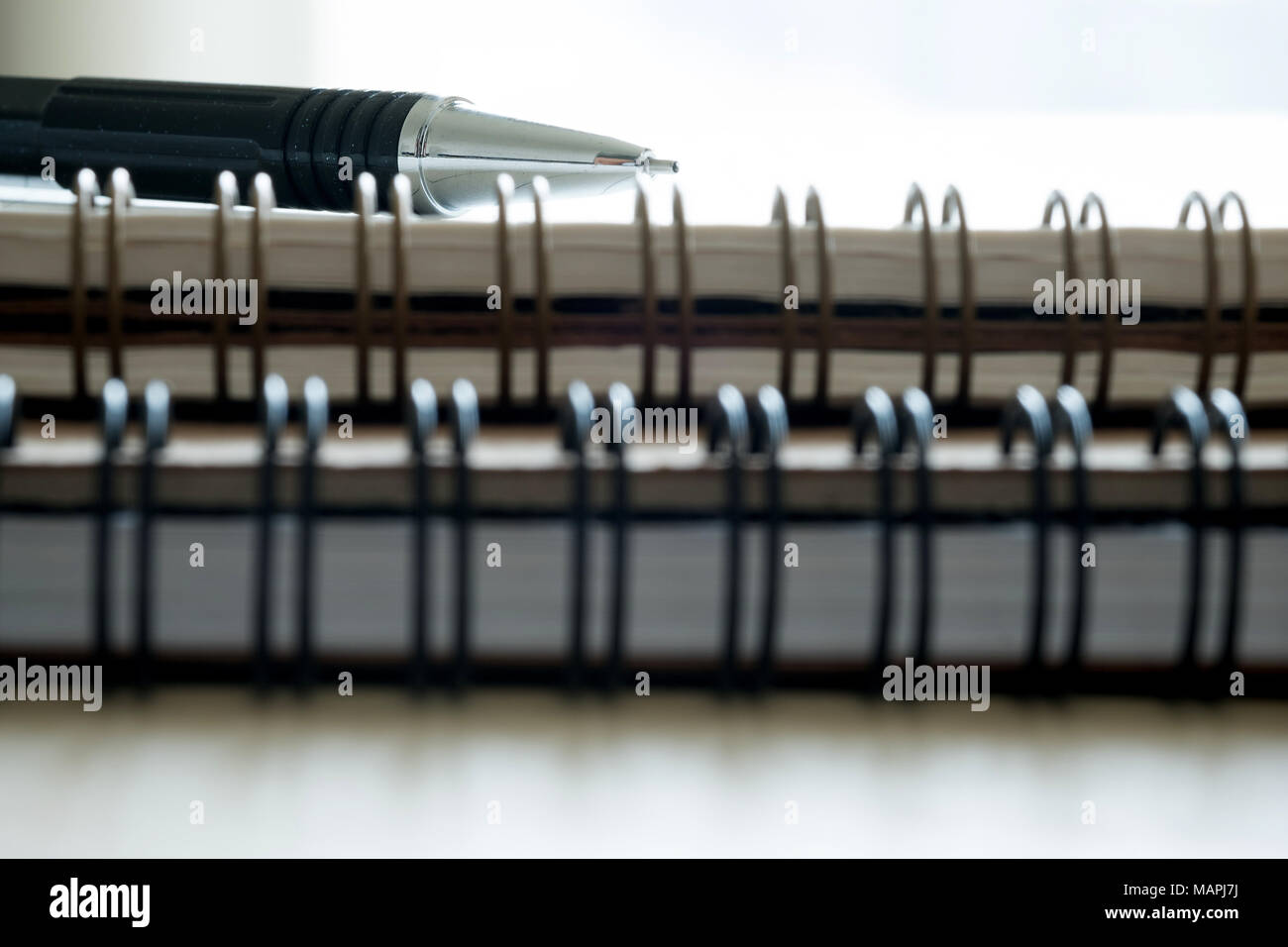 Extreme closeup of a spiral notebook closeup notepad as mockup for your ...