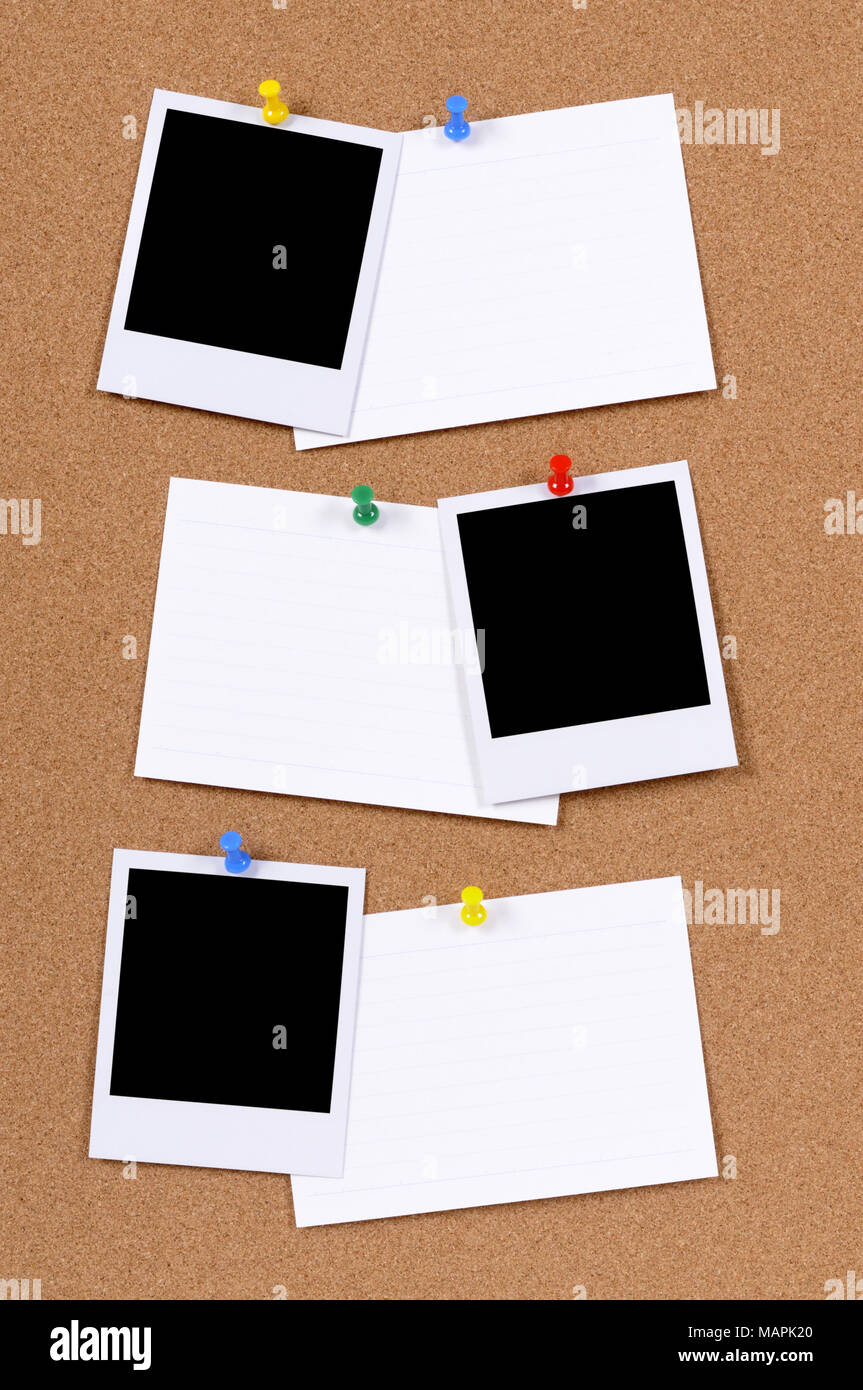 Blank photo prints with office index cards pinned to a cork bulletin ...