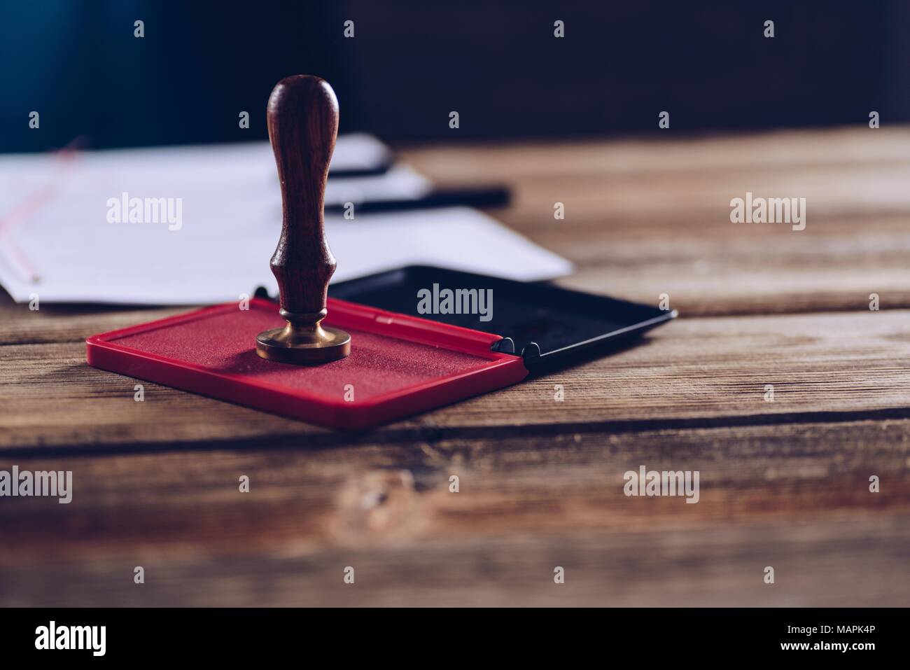 Notary public ink stamp on signed document. Law concept Stock Photo - Alamy