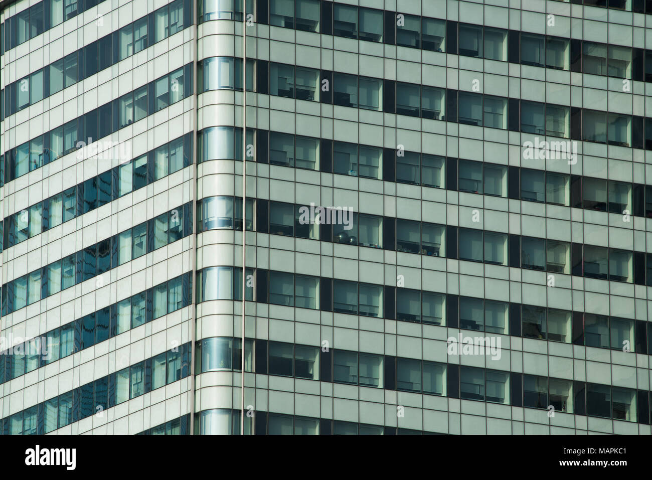 Glass facade of modern city high rise buildings background Stock Photo ...