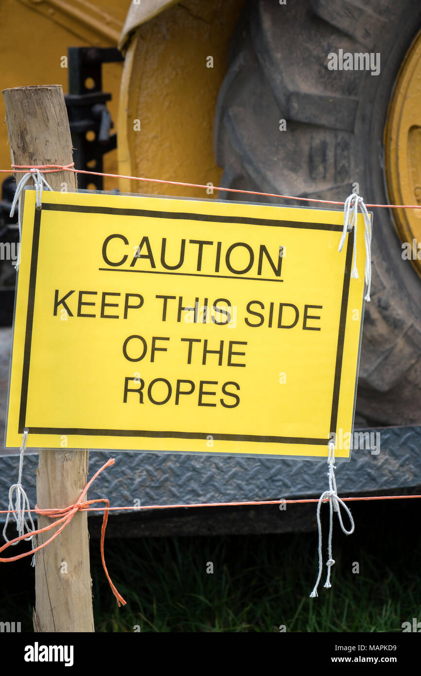 Caution Keep this side of the ropes Stock Photo - Alamy