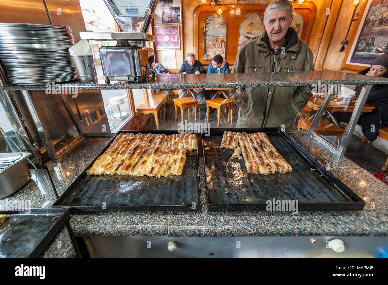 SARAJEVO, BOSNIA - JAN 27, 2018: Famous Bosnian pastry borek bourek ...