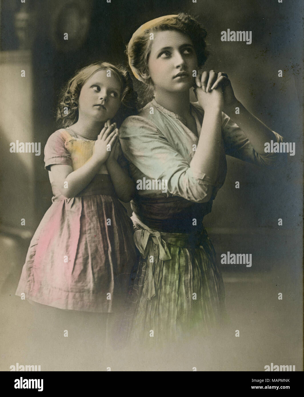 Two Girls Praying Stock Photo - Alamy