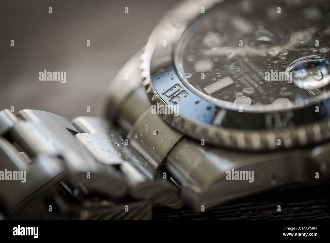 Closeup, shallow focus of an iconic, swiss-made men`s mechanical divers ...