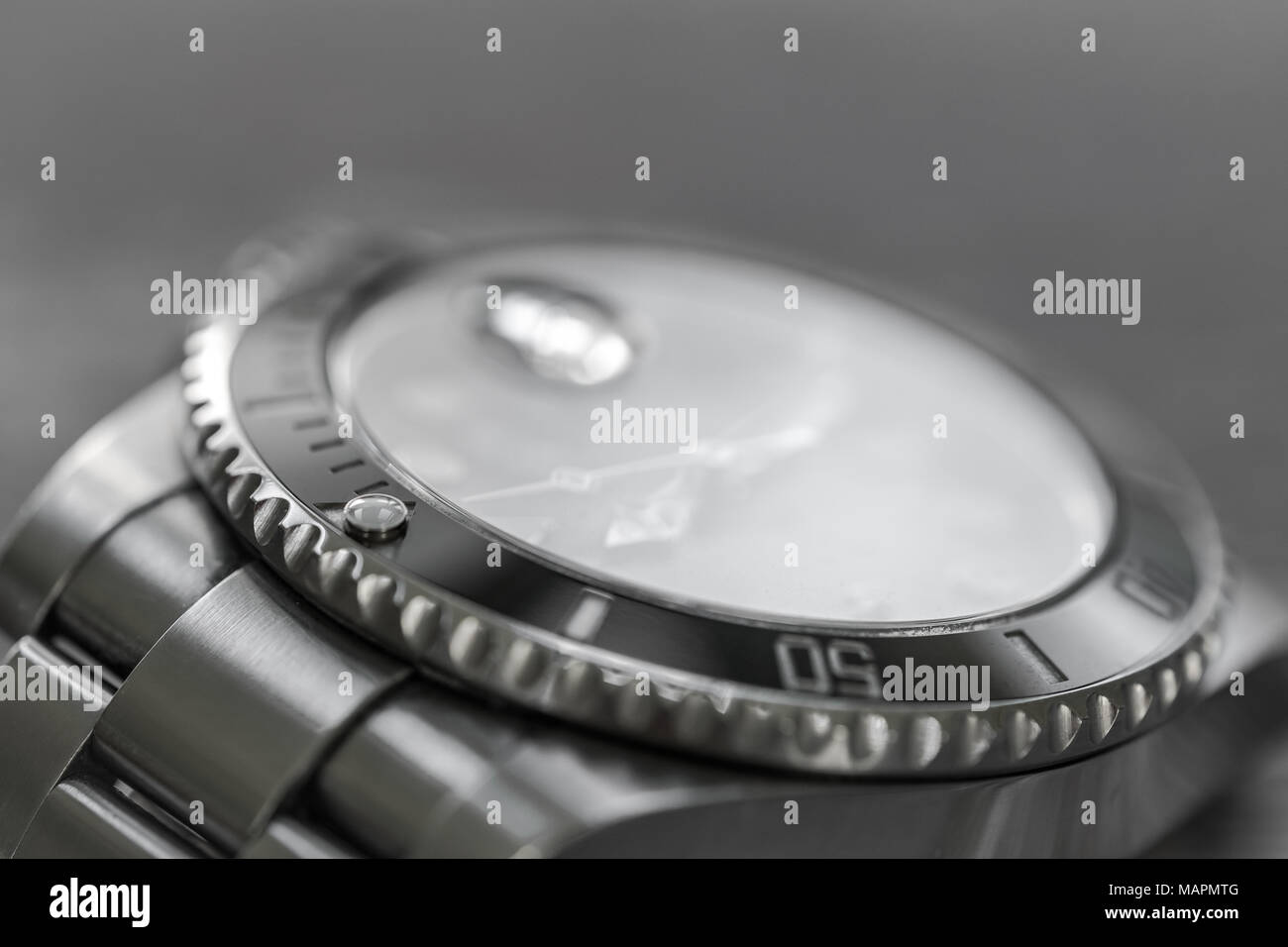 Closeup, shallow focus of an iconic, swiss-made men`s mechanical divers ...