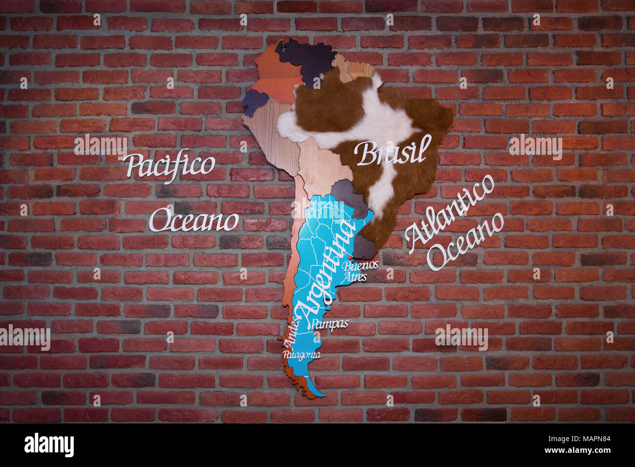 wood World map made of cow skin on a brick background Stock Photo - Alamy