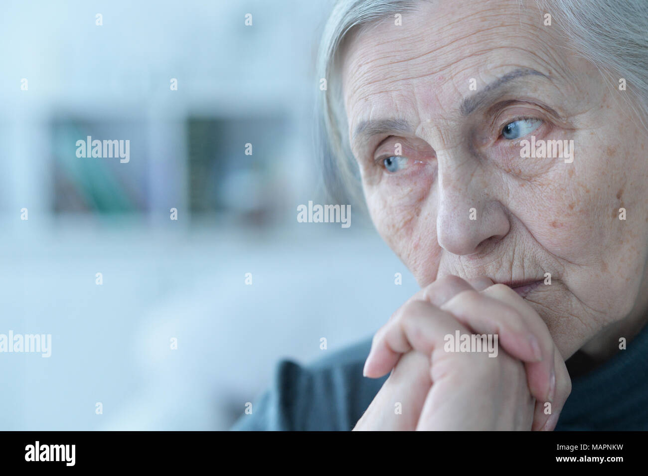 sad senior woman Stock Photo - Alamy