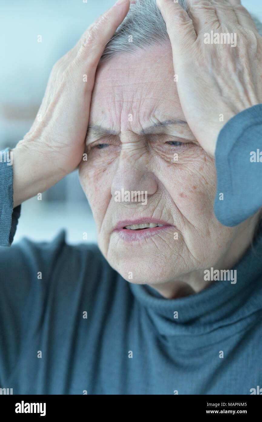 sad senior woman Stock Photo - Alamy