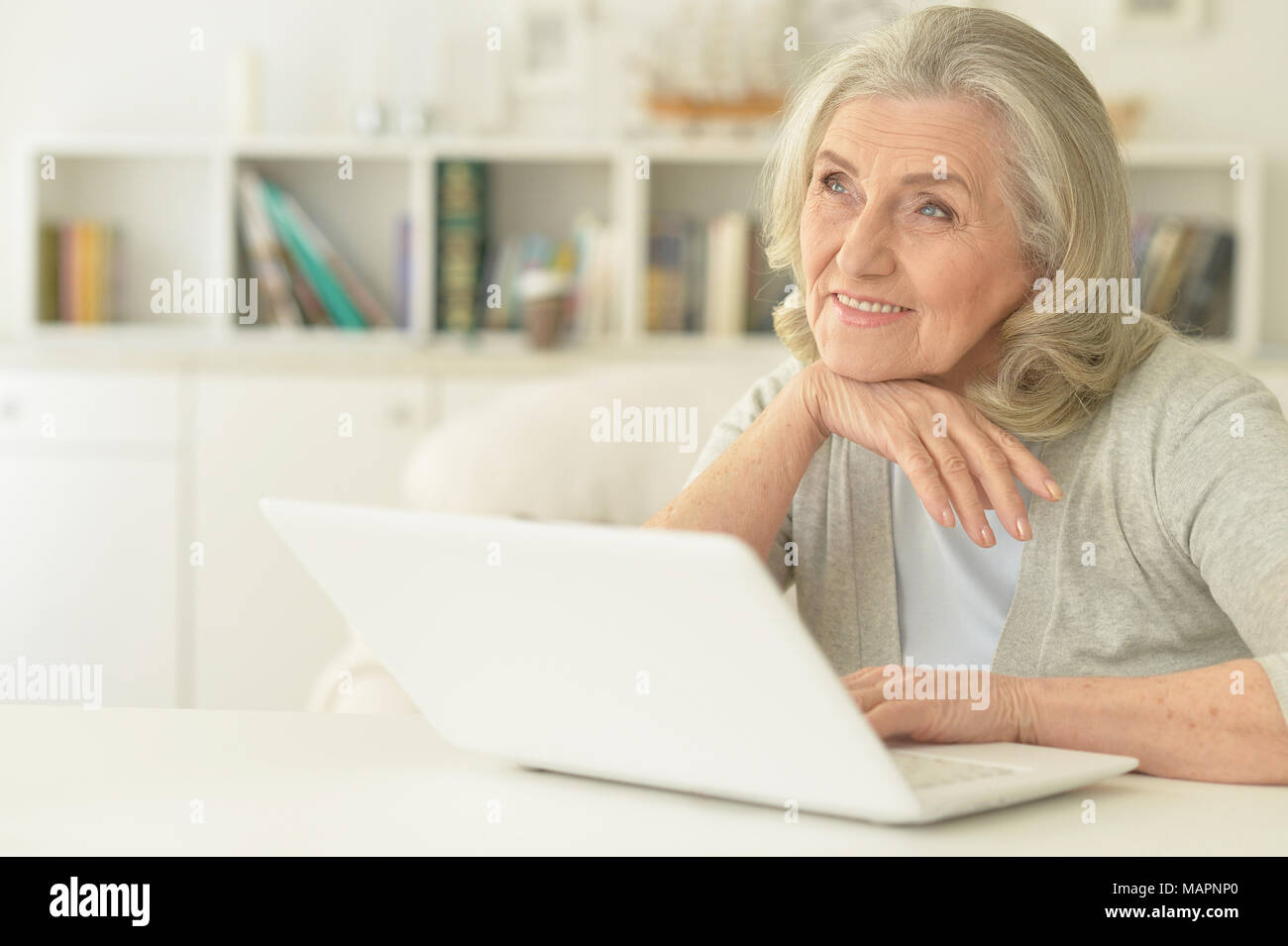 Middle aged woman using innovative hi-res stock photography and images ...