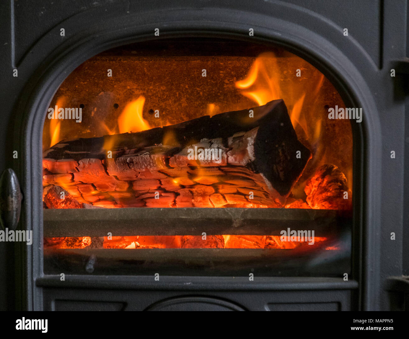 Real flames burning logs in hi-res stock photography and images - Alamy
