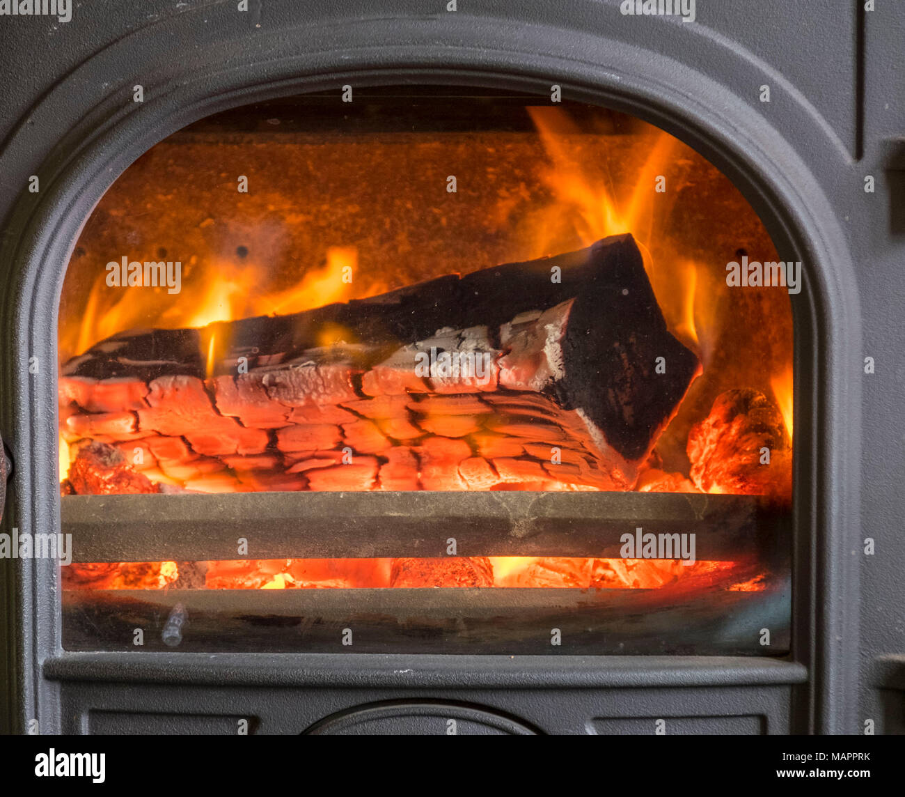 Real flames burning logs in hi-res stock photography and images - Alamy