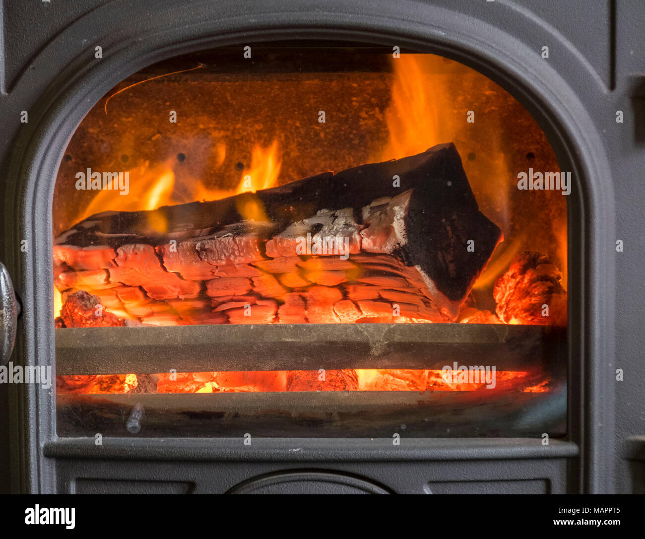 Real flames burning logs in hi-res stock photography and images - Alamy