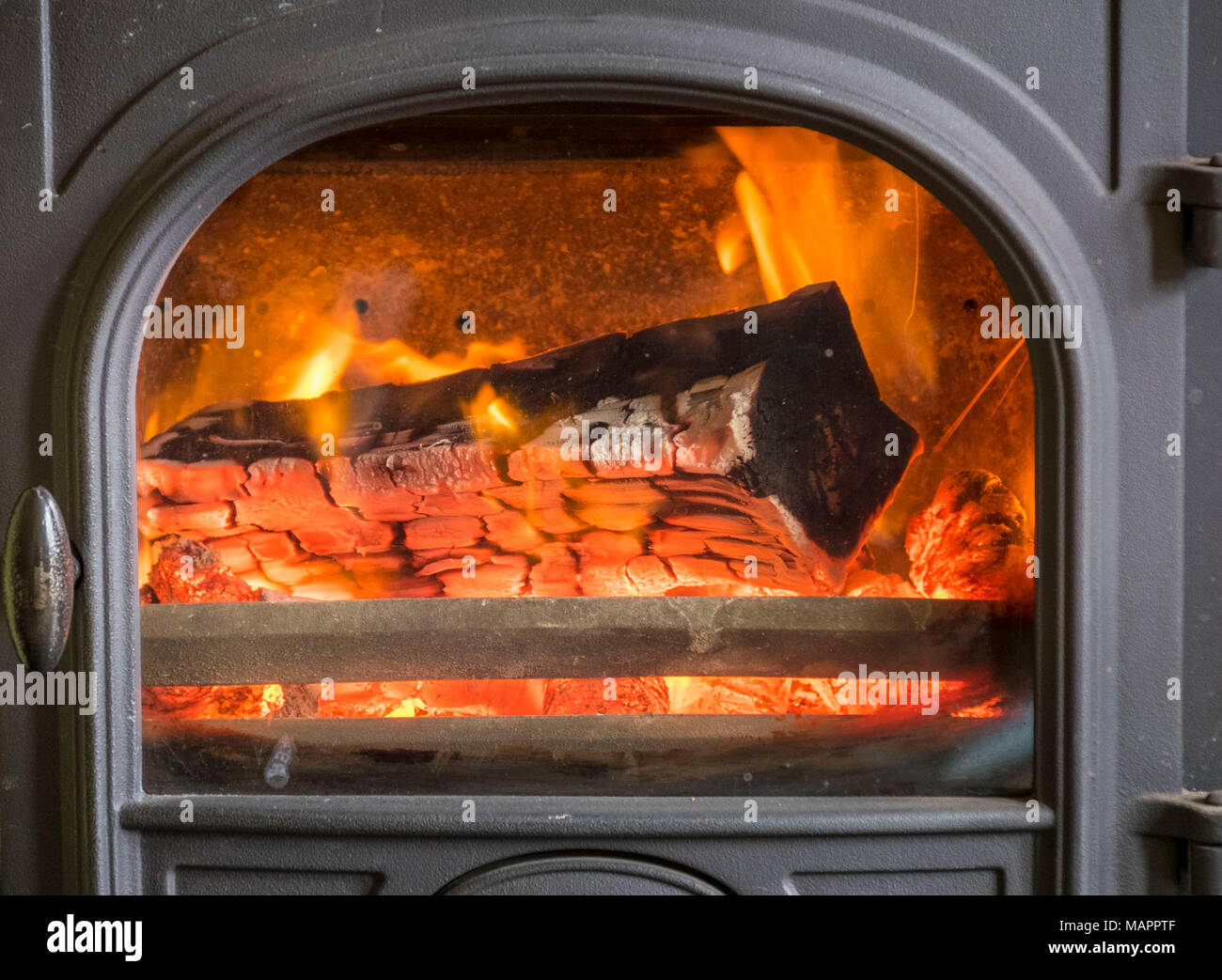 Log burner fire stove wood flames fuel heating hot burner hi-res stock ...