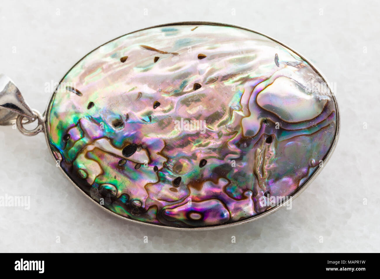 macro shooting of natural mineral rock specimen - pendant from Abalone ...