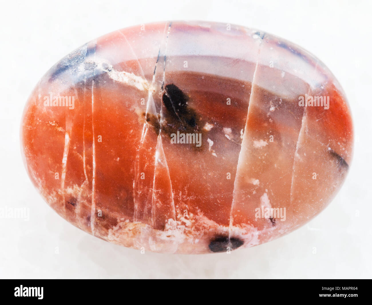 macro shooting of natural mineral rock specimen - bead from red ...