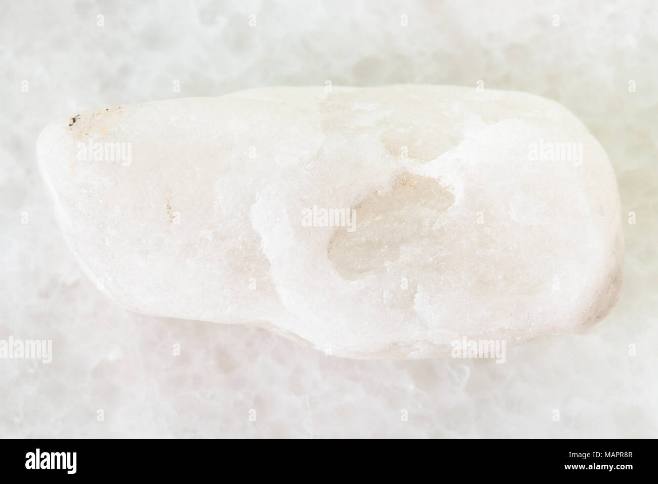 macro shooting of natural mineral rock specimen - white marble stone on ...