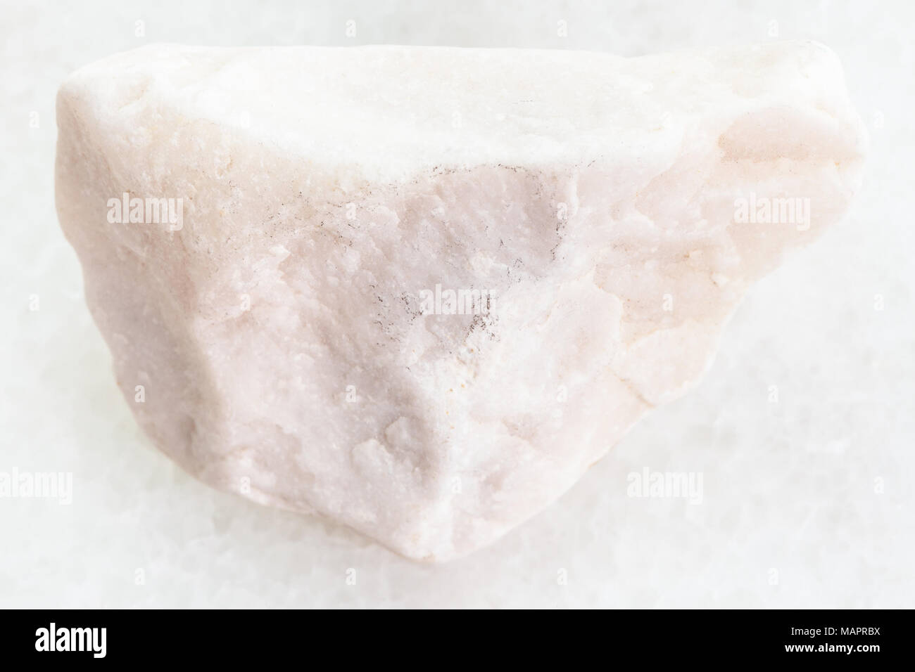 macro shooting of natural mineral rock specimen - piece of white marble ...