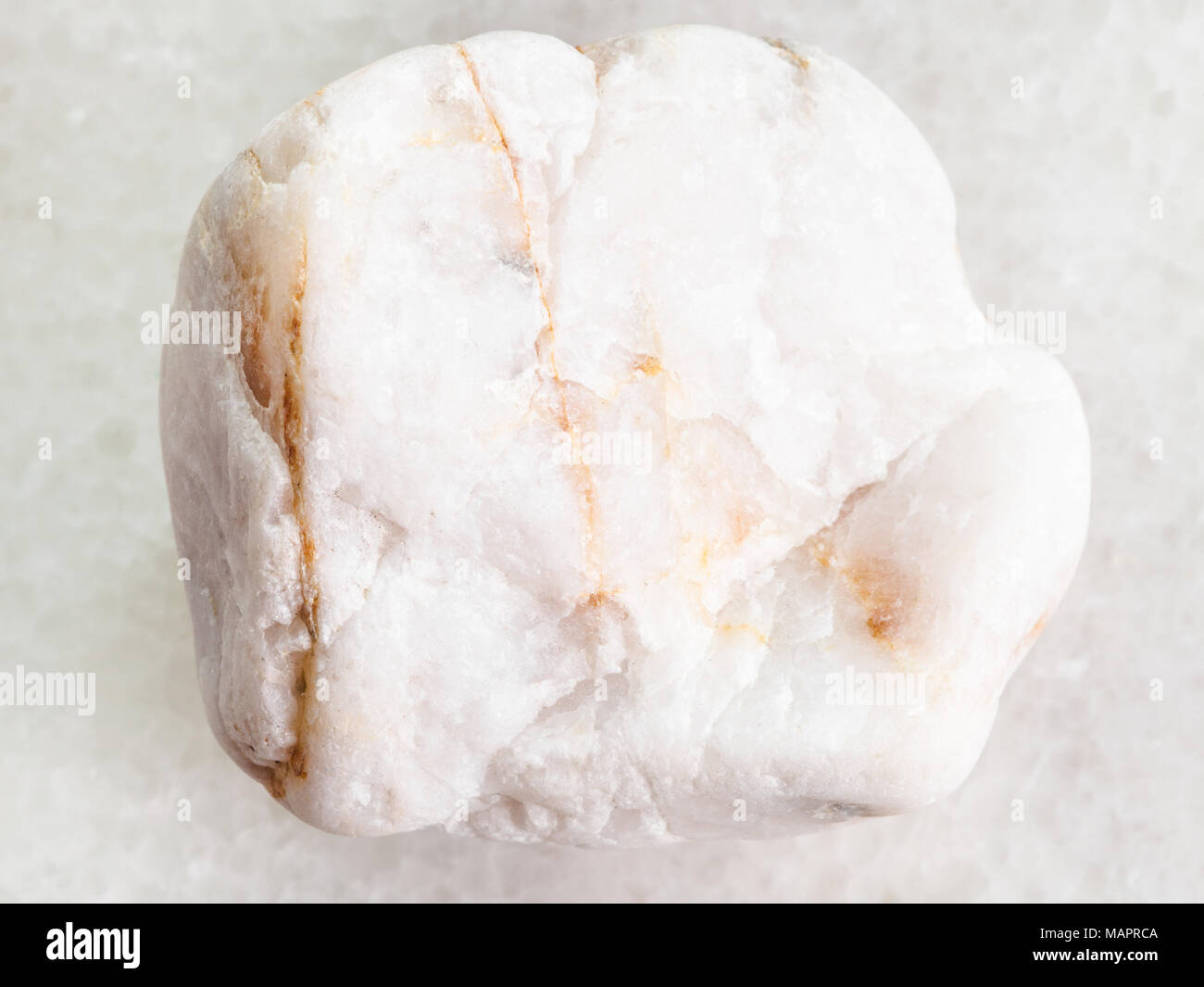 macro shooting of natural mineral rock specimen - white marble gem on ...