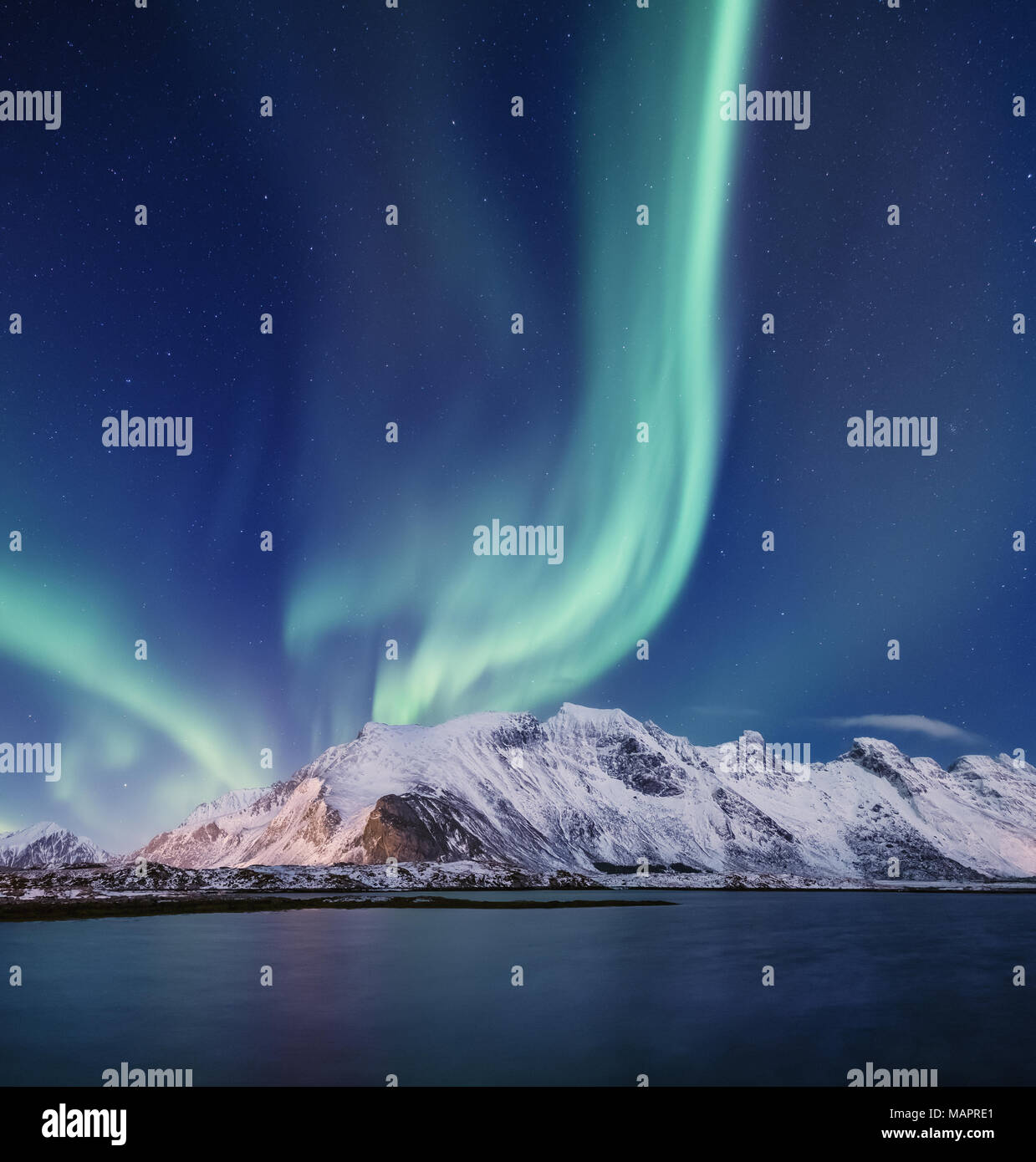 Northen light under mountains. Beautiful natural landscape in the ...