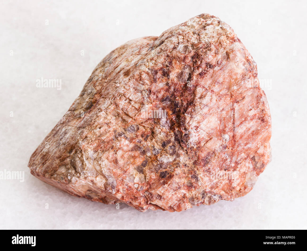 macro shooting of natural mineral rock specimen - pink Granite stone on ...