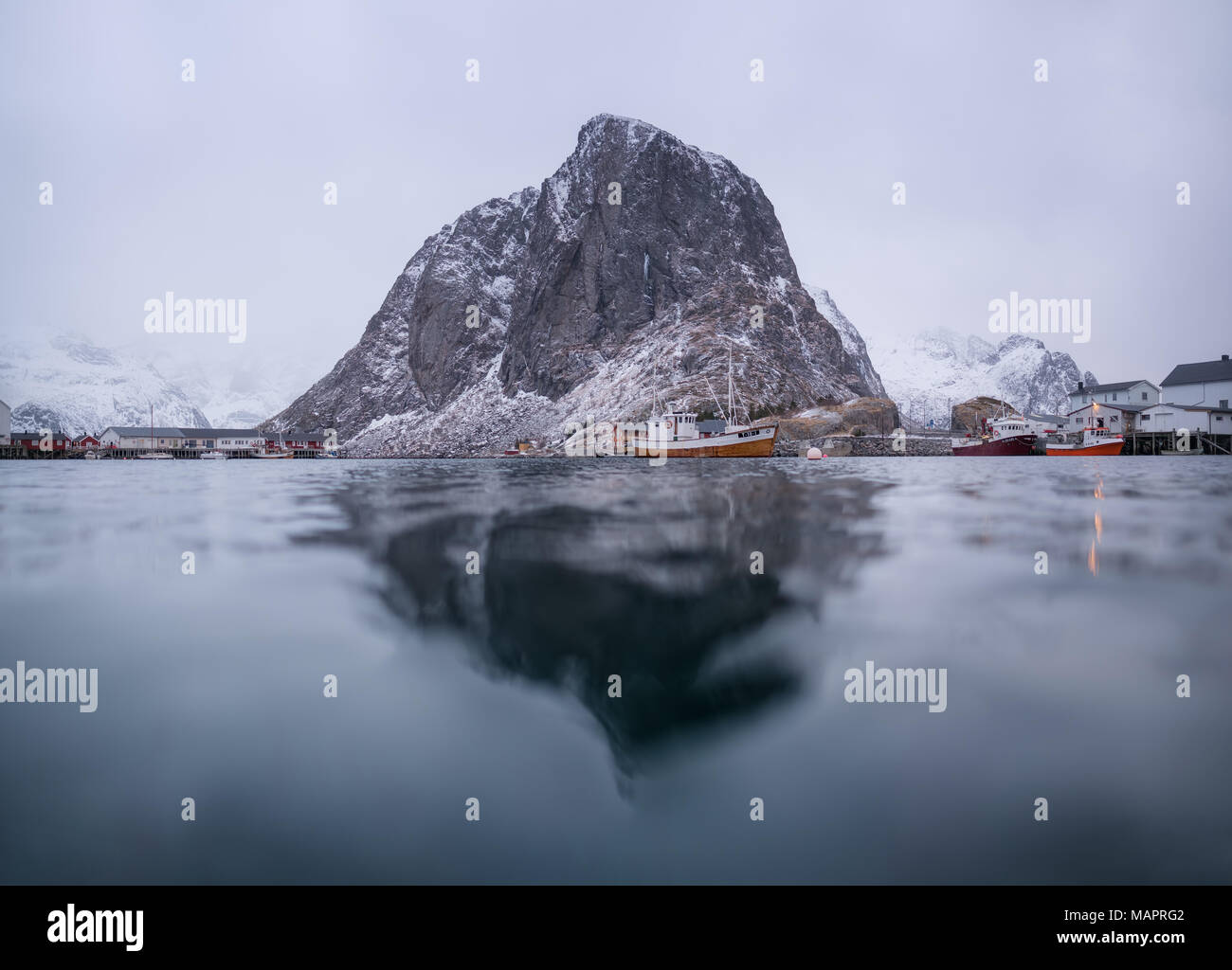 Boat in the Norway bay and reflection on water surface. Beautiful ...