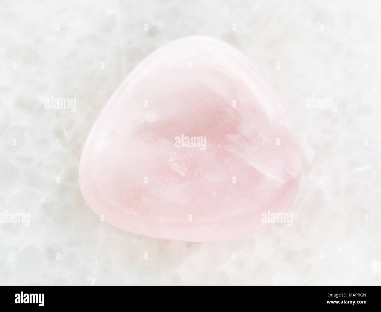 macro shooting of natural mineral rock specimen - polished pink Quartz ...