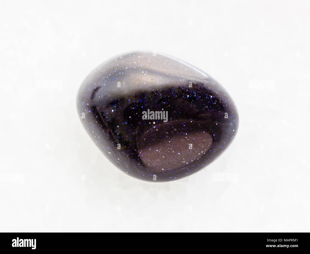 macro shooting of mineral rock specimen - tumbled blue goldstone ...