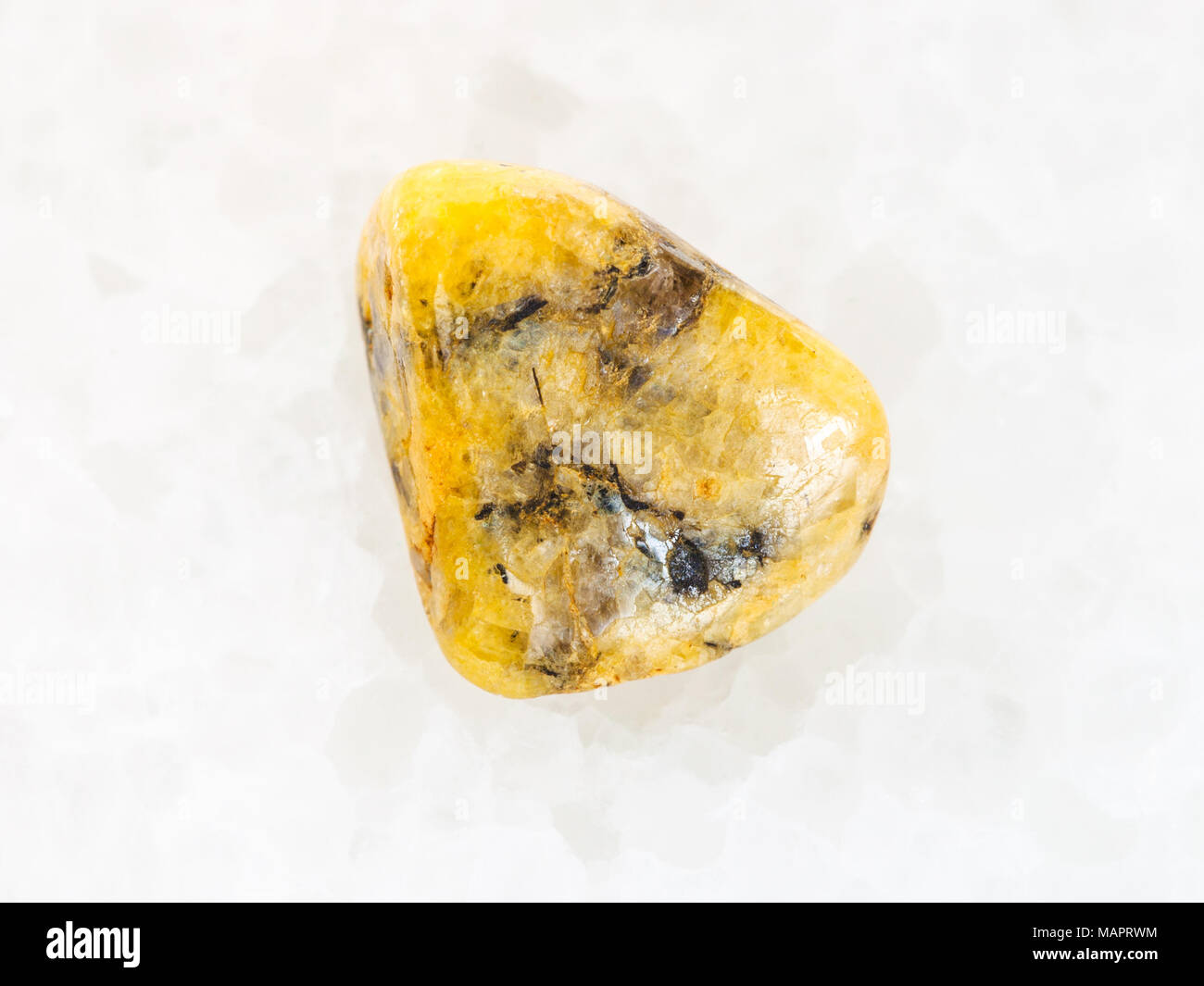 macro shooting of natural mineral rock specimen - tumbled yellow Agate ...