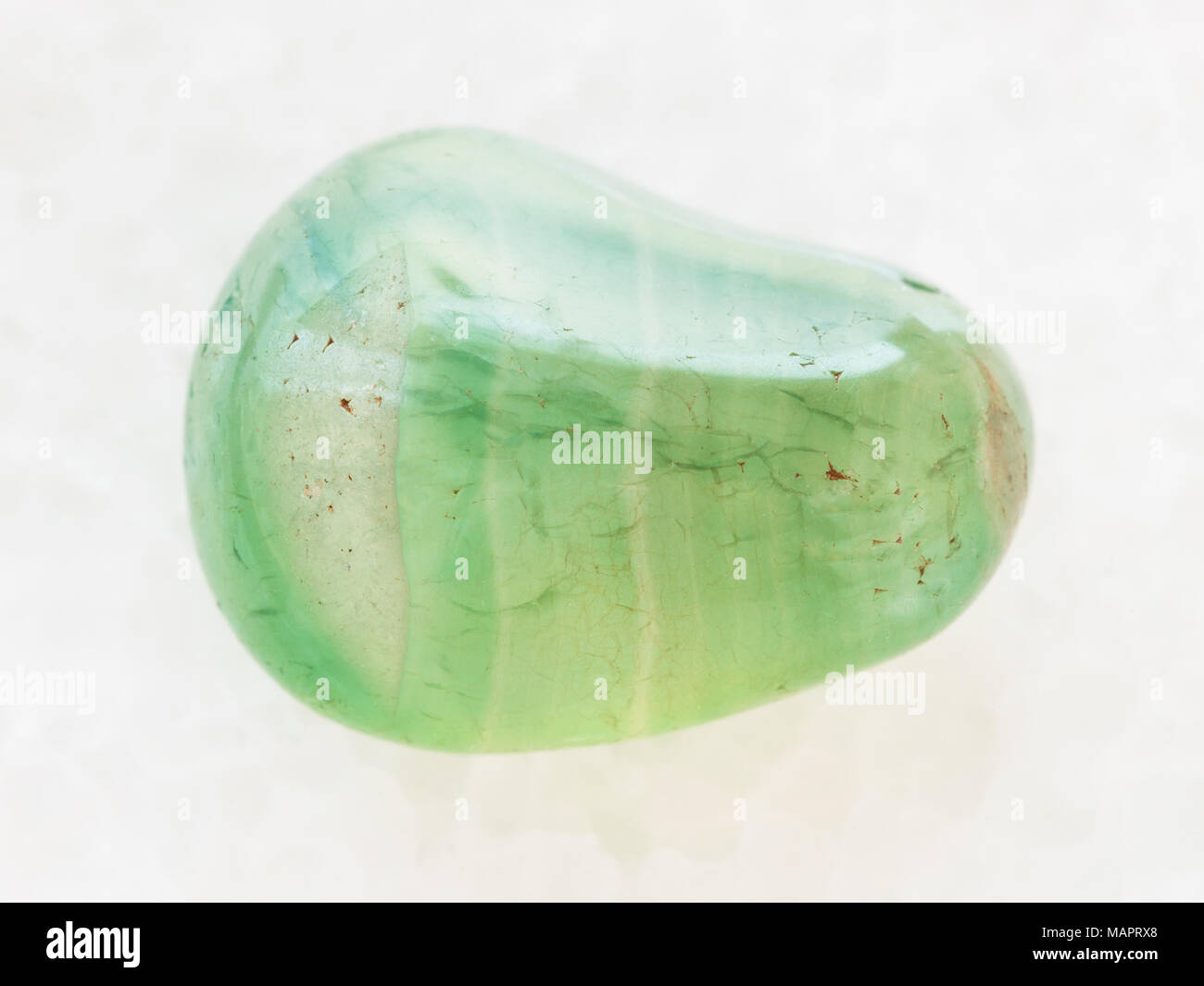 macro shooting of natural mineral rock specimen - polished green ...