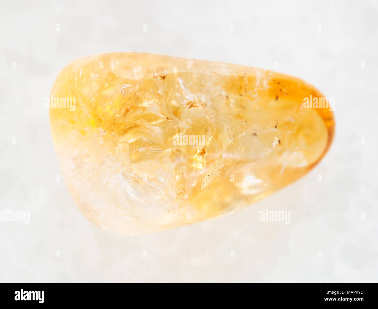 macro shooting of natural mineral rock specimen - tumbled Citrine ...
