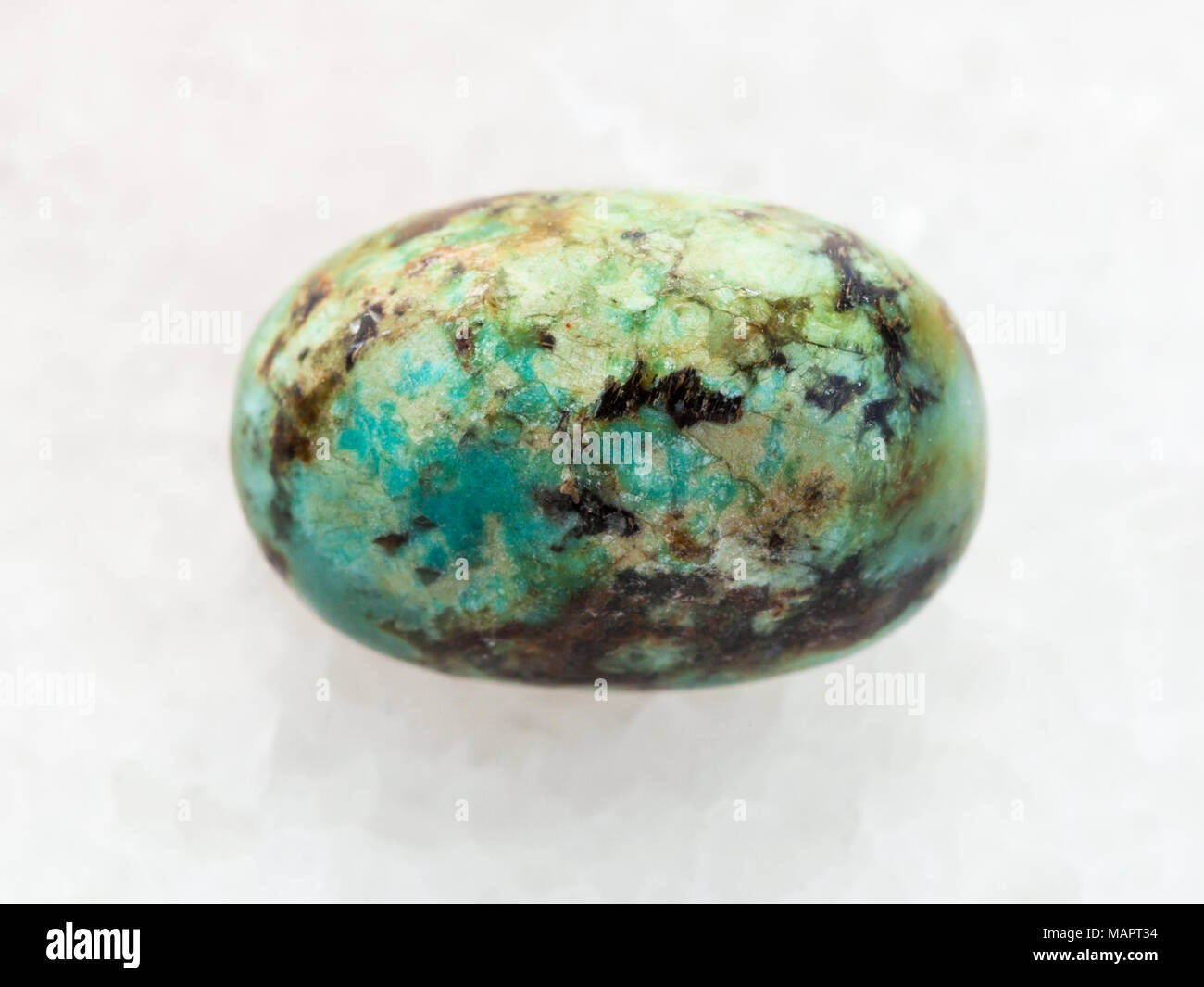 macro shooting of natural mineral rock specimen - tumbled turquoise ...