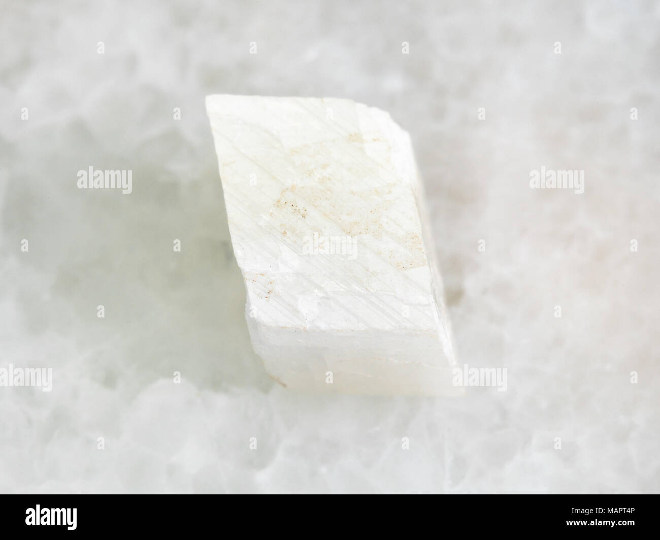 macro shooting of natural mineral rock specimen - raw white calcite ...