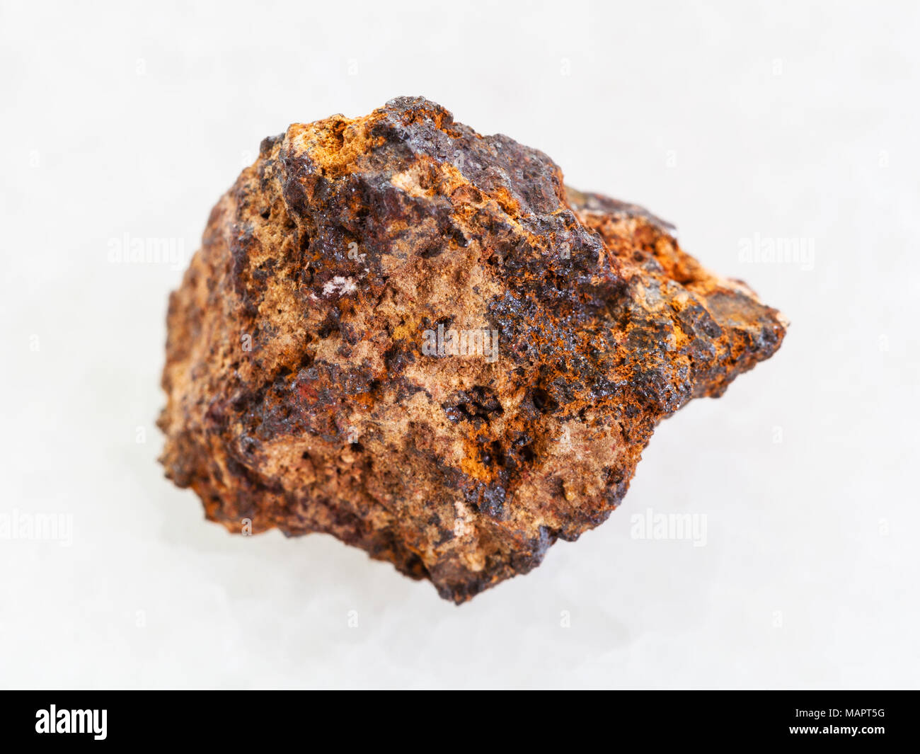 macro shooting of natural mineral rock specimen - raw Hematite (iron ...