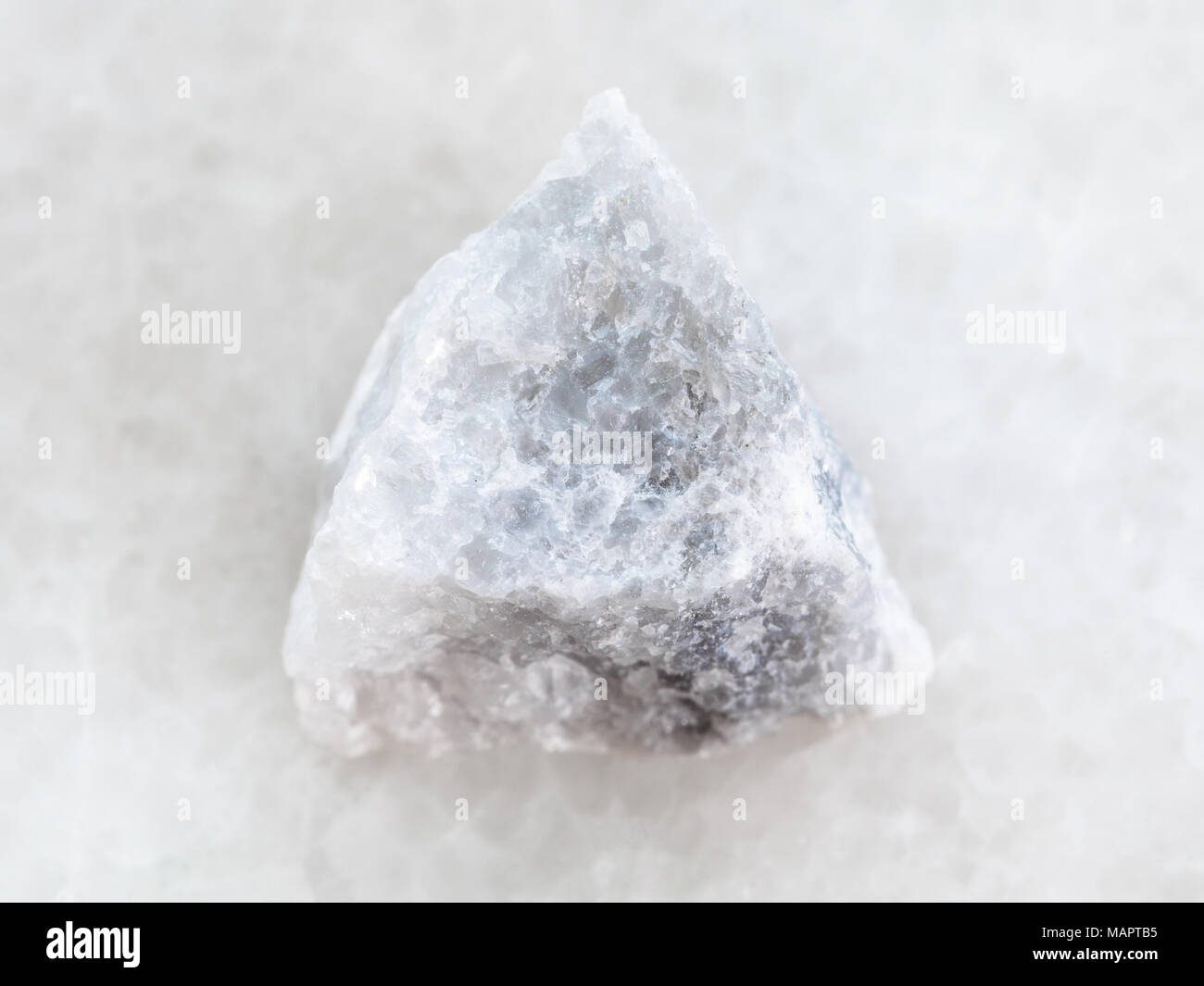 macro shooting of natural mineral rock specimen - raw gray Marble stone ...