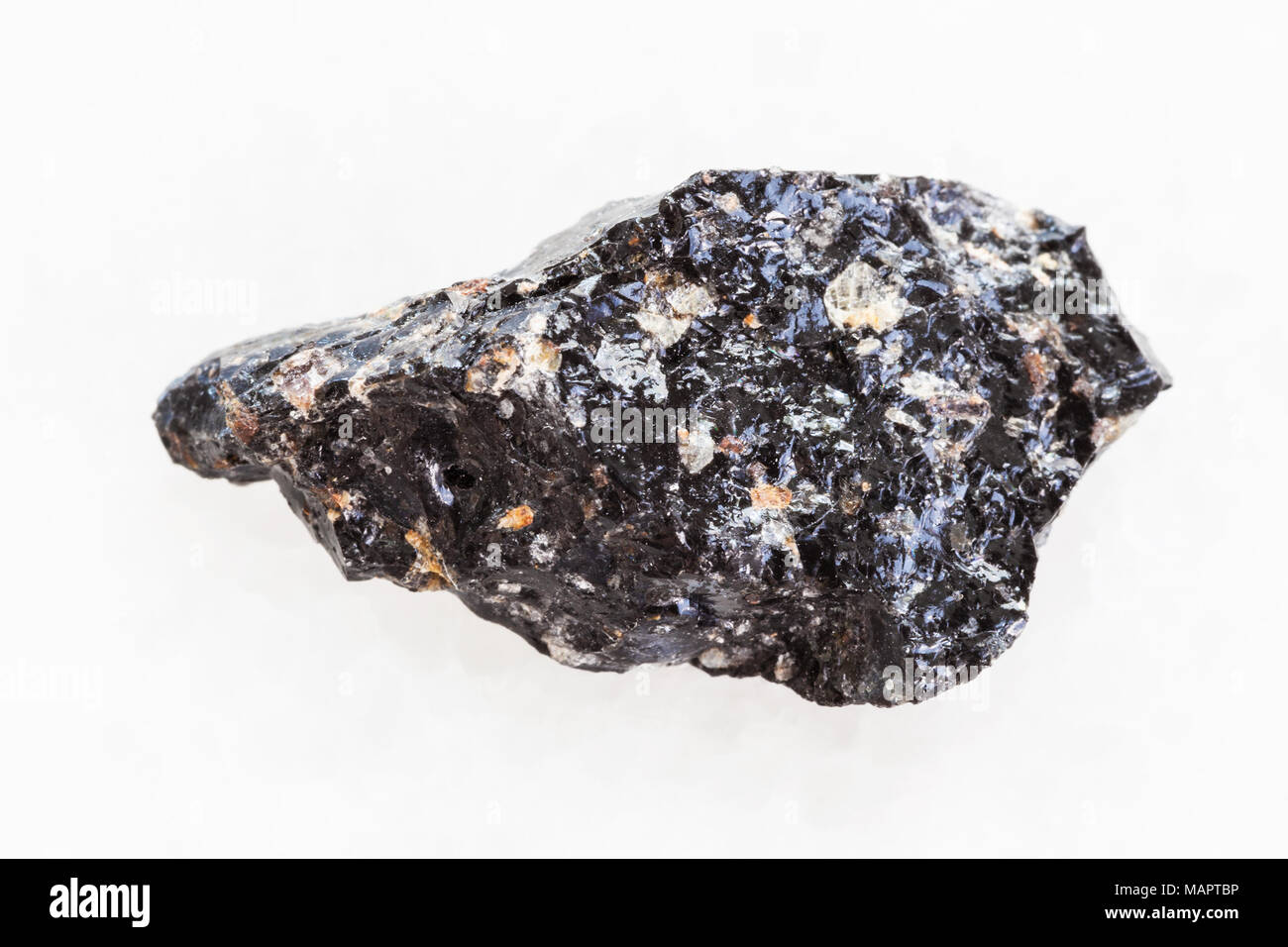 macro shooting of natural mineral rock specimen - rough obsidian ...